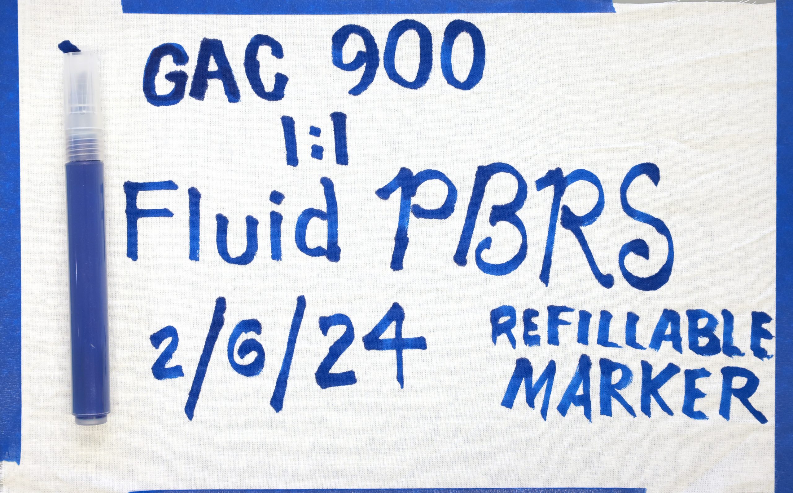 A marker filled with a 1:1 ratio of High Flow paints and GAC 900 ...
